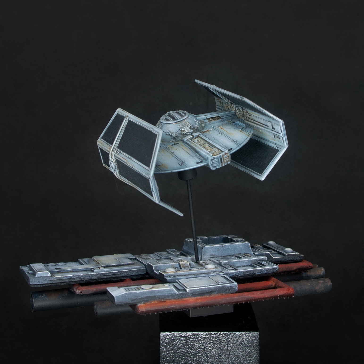 Scale Model of TIE Advanced X1 flying over the Death Star surface