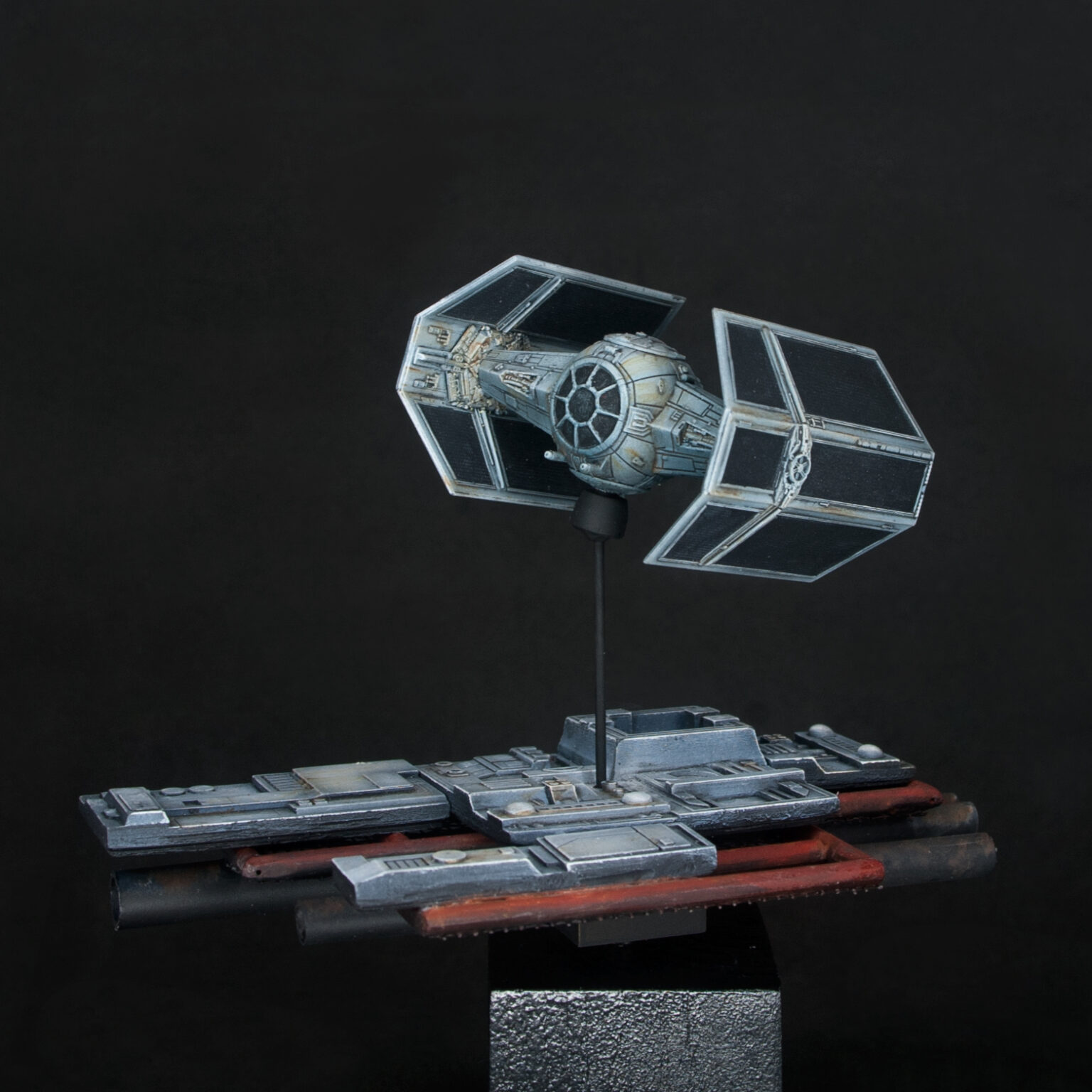 Scale Model of TIE Advanced X1 flying over the Death Star surface
